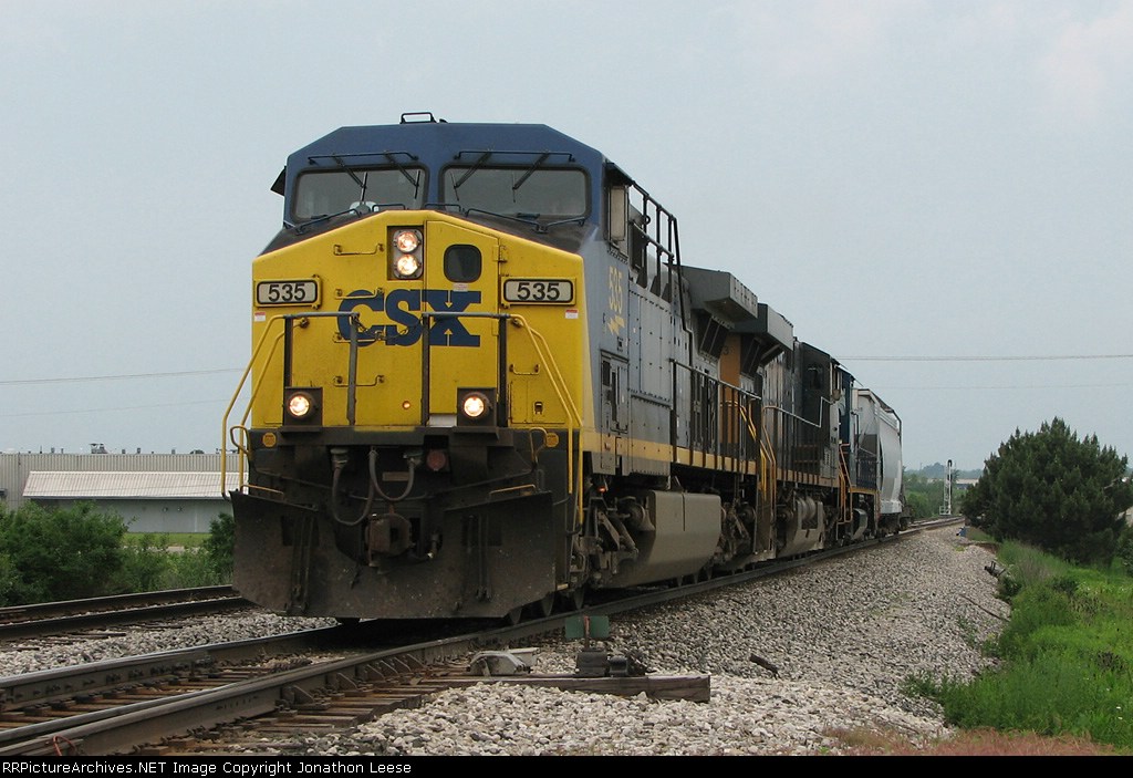 CSX 535 leading Q326 east with 3 units, 1 car and an RC sled